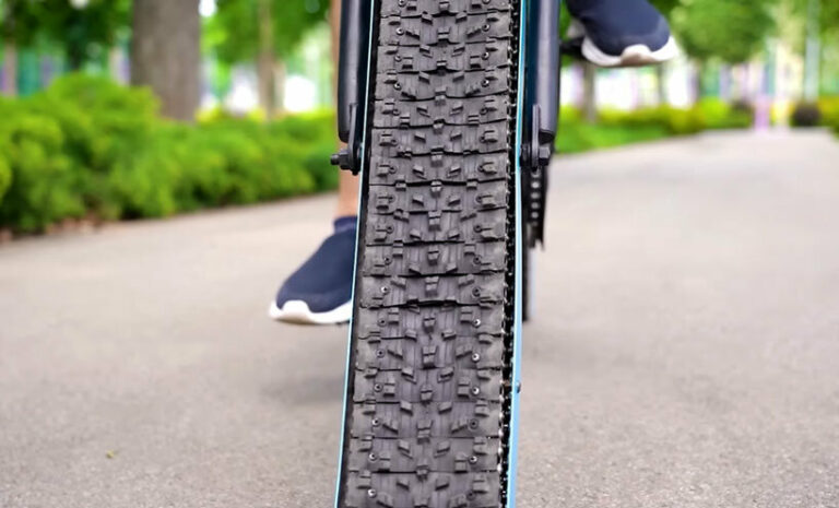 mimicking the mechanics of a tank, engineer builds custom 'wheelless' bike