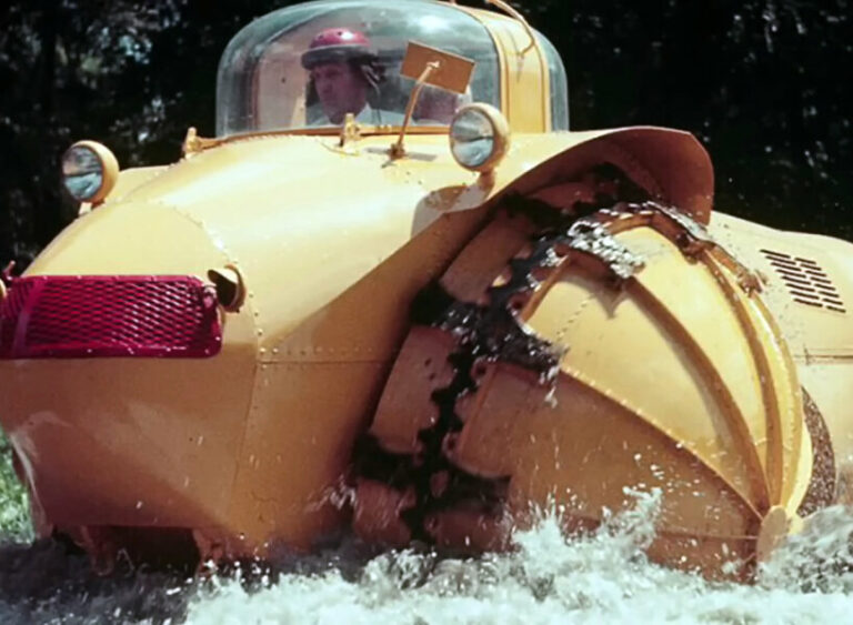 inventor modifies used tractor into all-terrain armored 'rhino tank ...