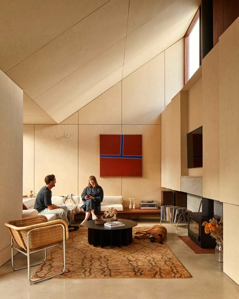 grotto studio's charred timber 'shadow house' extends perth cottage