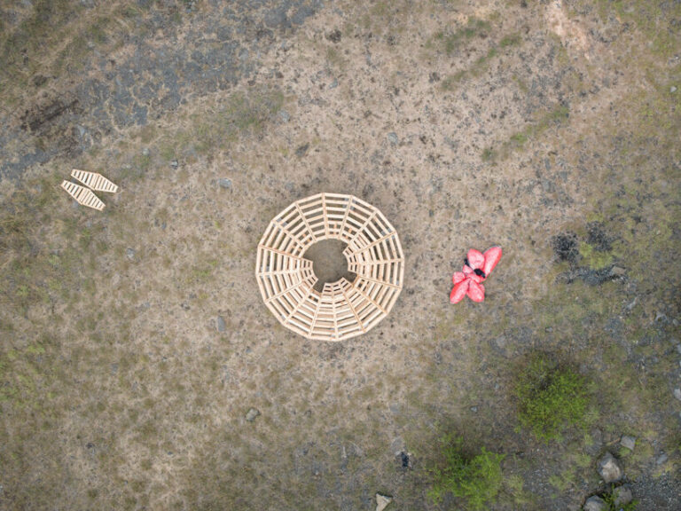 spaceship earth timber installation lands at hello wood festival in hungary