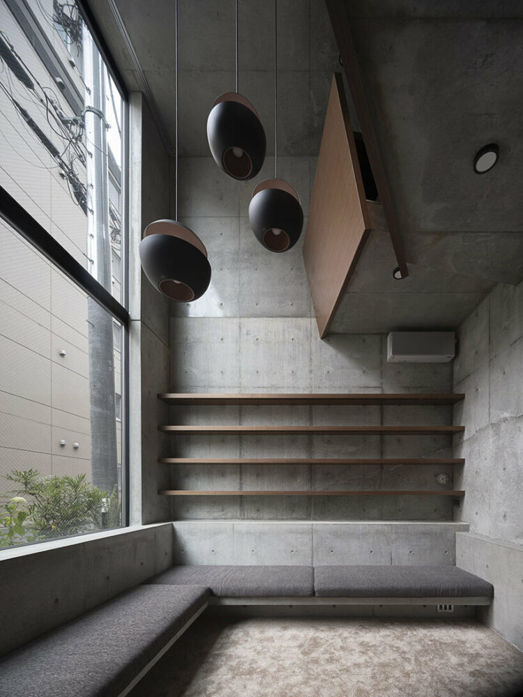 K+S architects fronts home-office with striated concrete texture