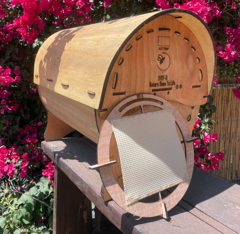 transparent and round beehive lets keepers see the bees and collect ...