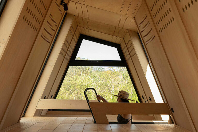 prefab SULA cabin journeys from quito to its galápagos island site