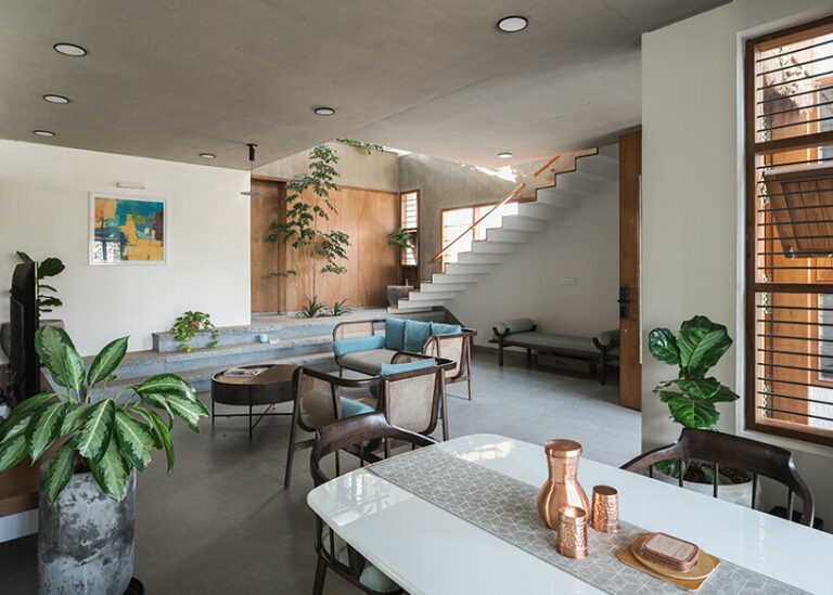 a threshold's green-filled 'ineffable light' house in bangalore