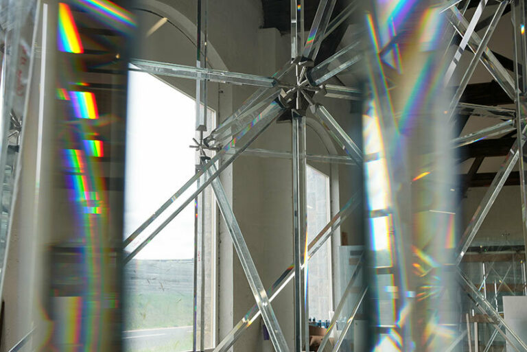 monumental glass grid installation by emmanuel barrois illuminates ...