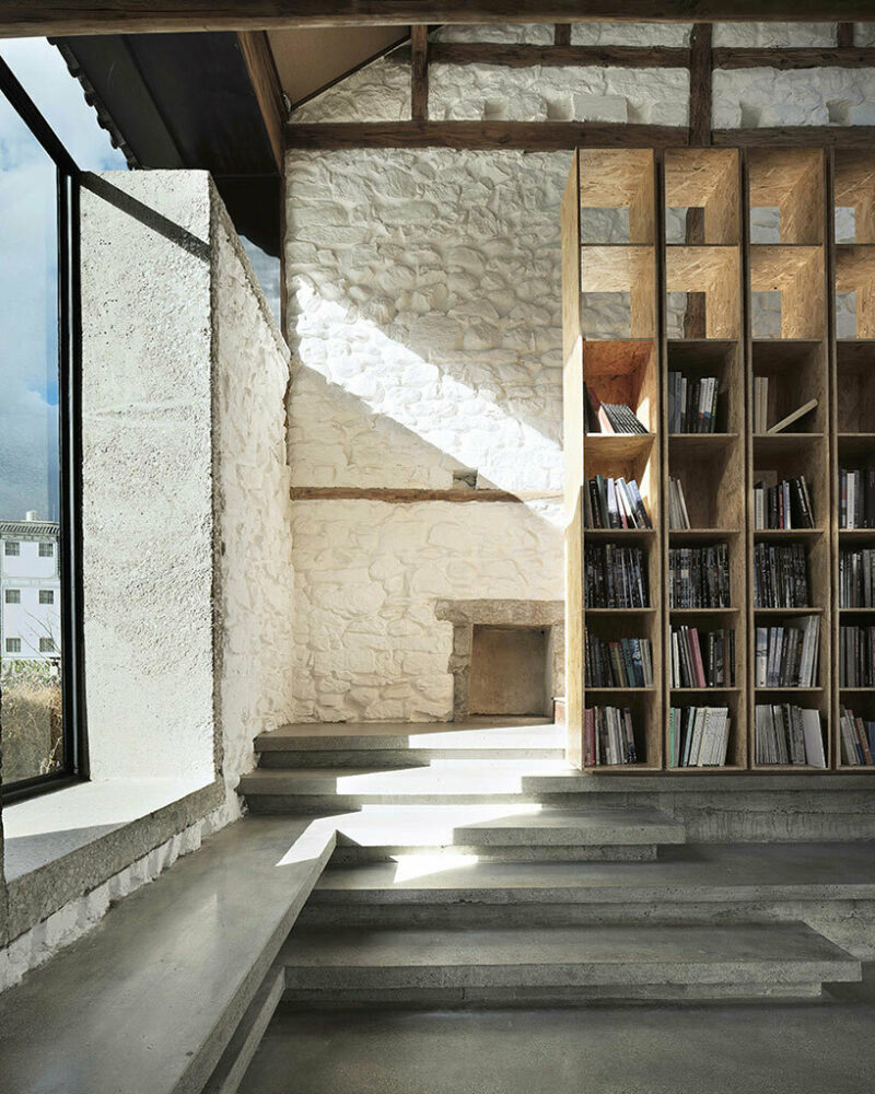 arCONNECT revives cavernous stone ruins with glass studio space