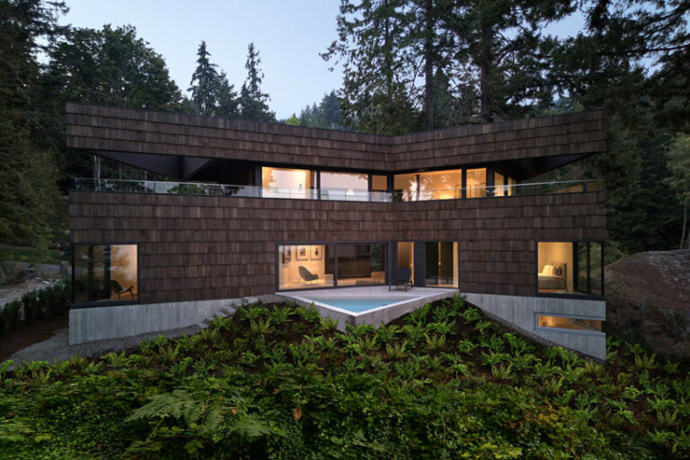 triangular pool juts out from the phoenix house celebrating the ...