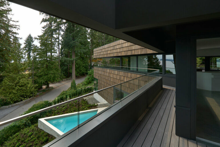 triangular pool juts out from the phoenix house celebrating the ...