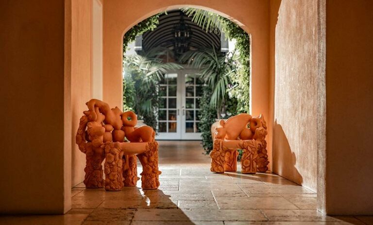 chris wolston's terracotta chairs blossom in gardens at hotel bel-air