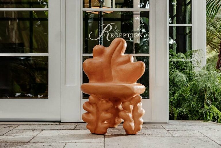 chris wolston's terracotta chairs blossom in gardens at hotel bel-air