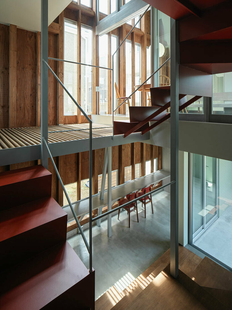 split-level platforms build up archidivision's dance floor house in tokyo