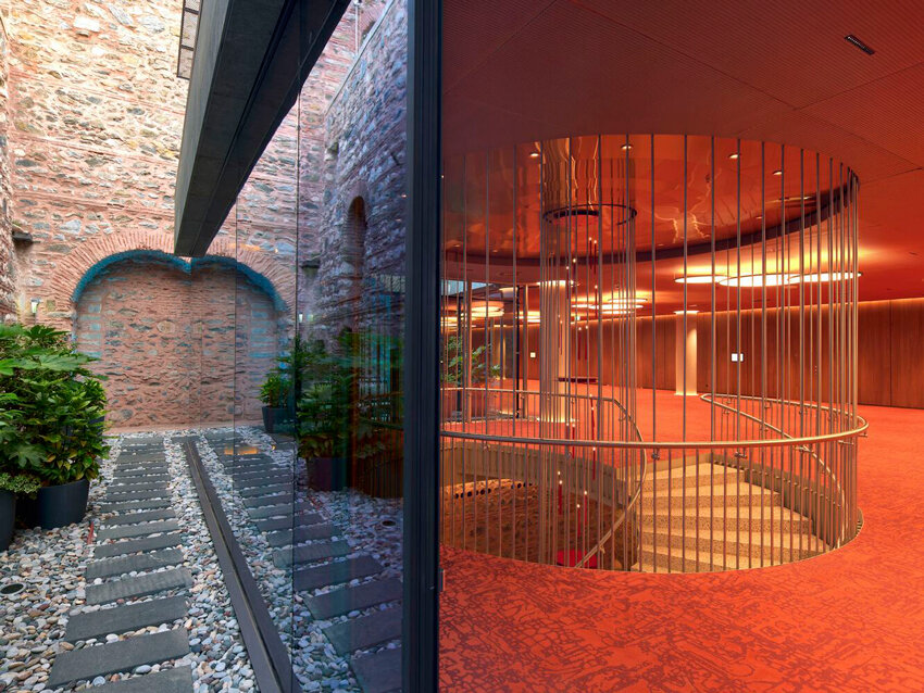 undulating steel canopy by GAD tops historic building in istanbul