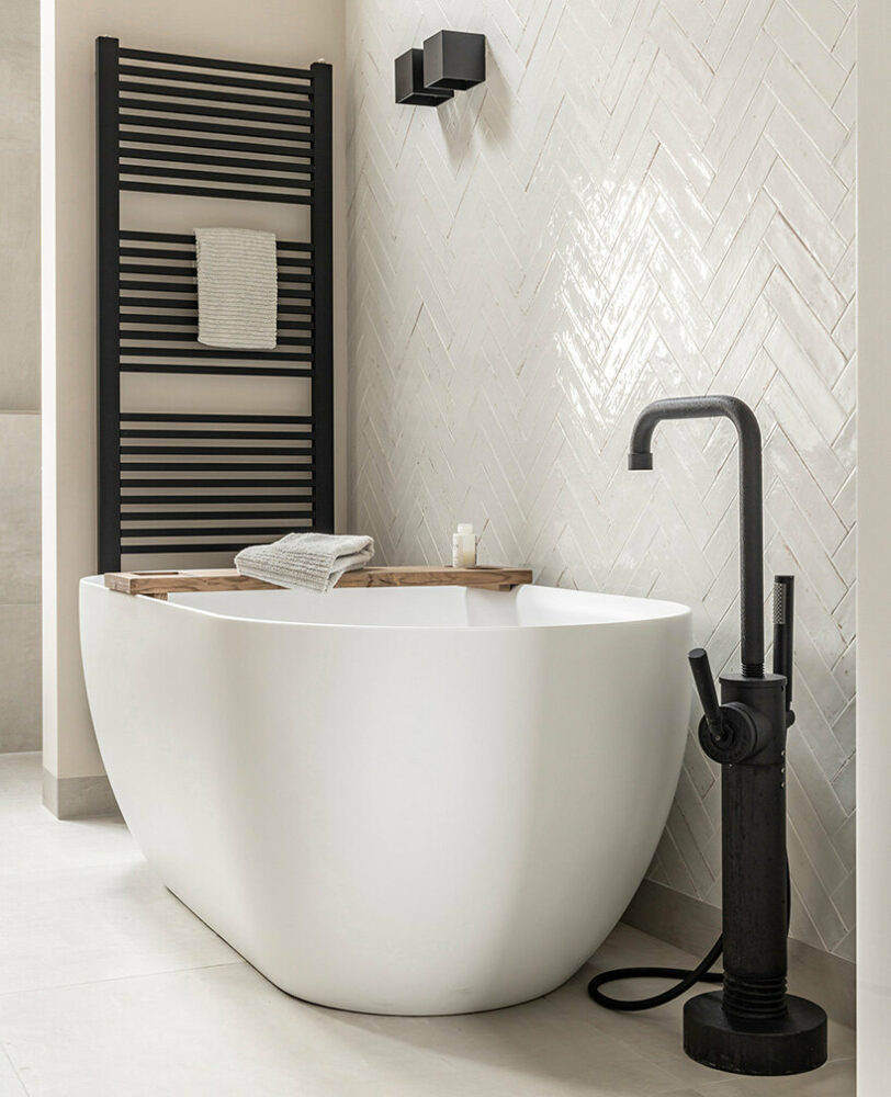 JEE-O cone tapware collection crafted from elemental, elegant shapes