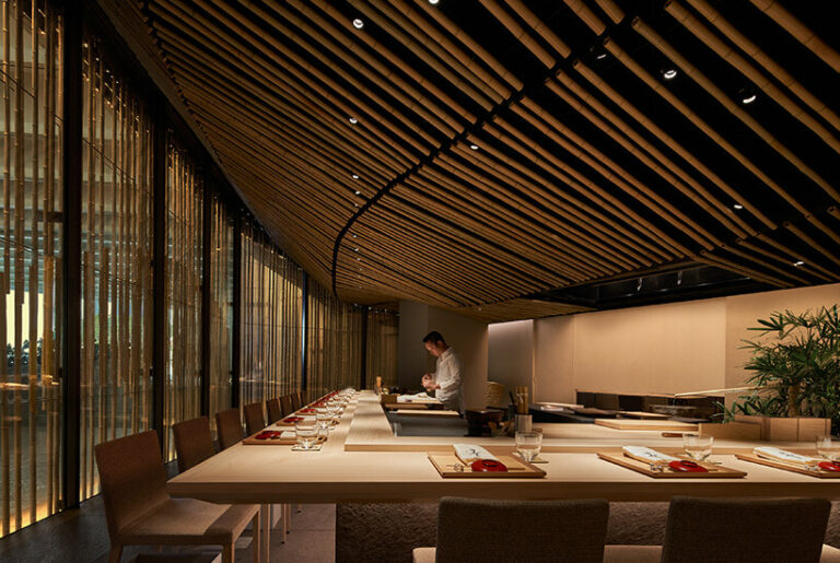 inside kengo kuma's bamboo-lined SUZUKI sushi bar in singapore