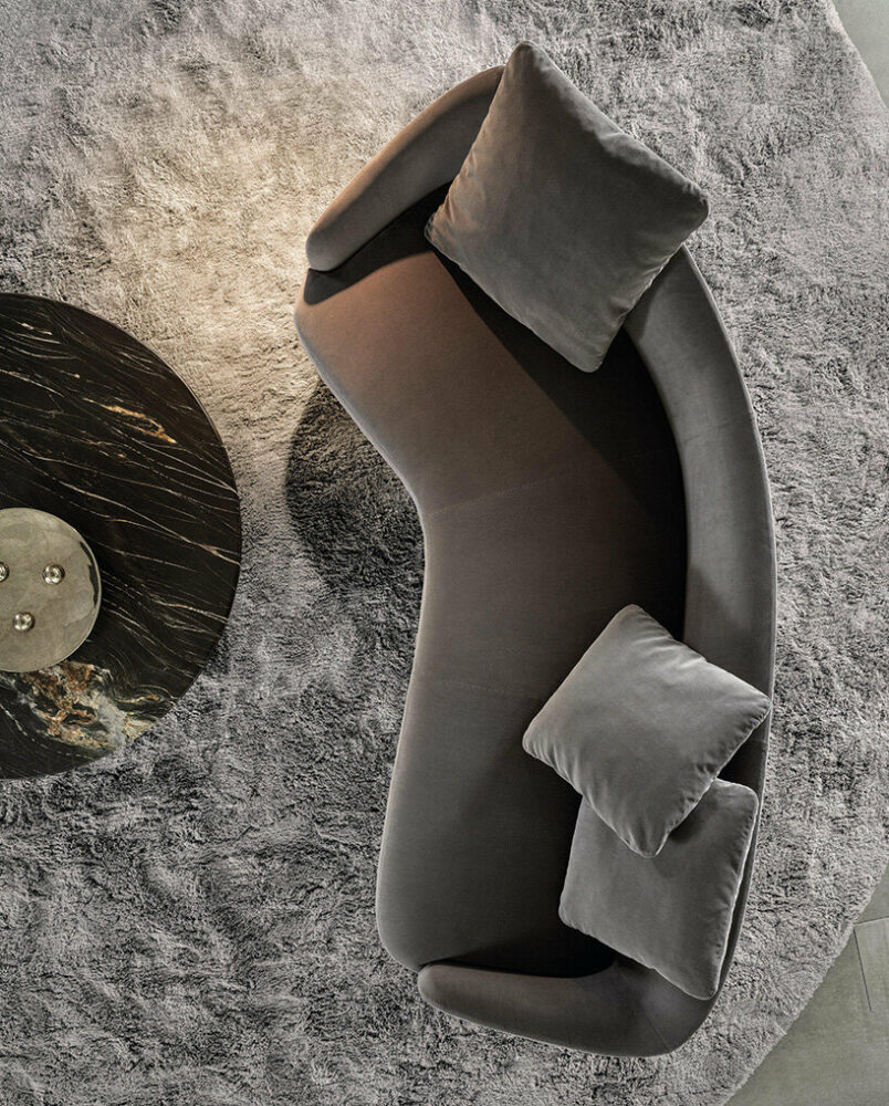 minotti 2023 furniture collection balances solid volumes and organic lines