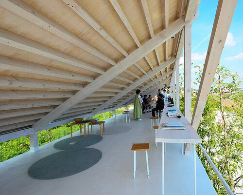 studio velocity tops wooden office in japan with curved inhabitable roof