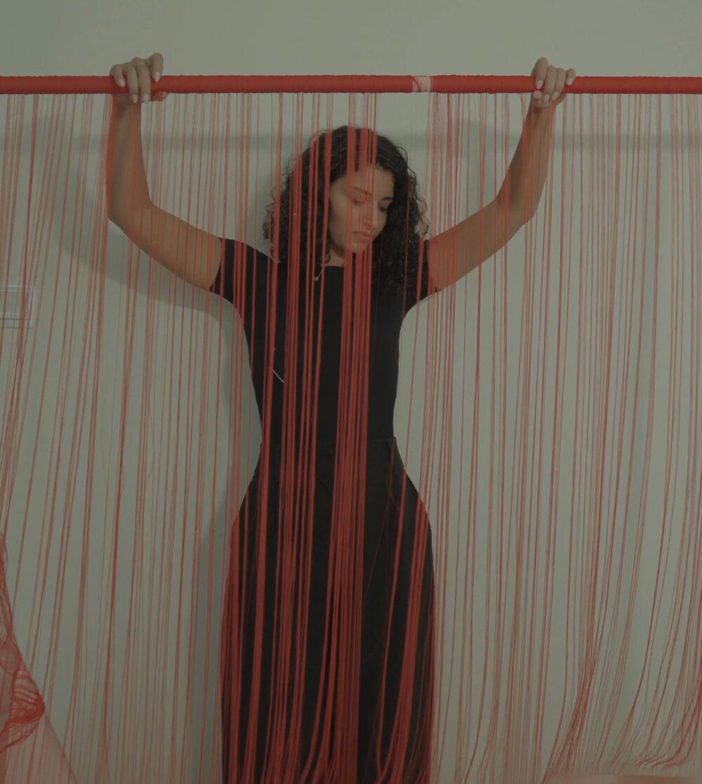 areen’s flowing installation unravels thousands of threads at dubai ...