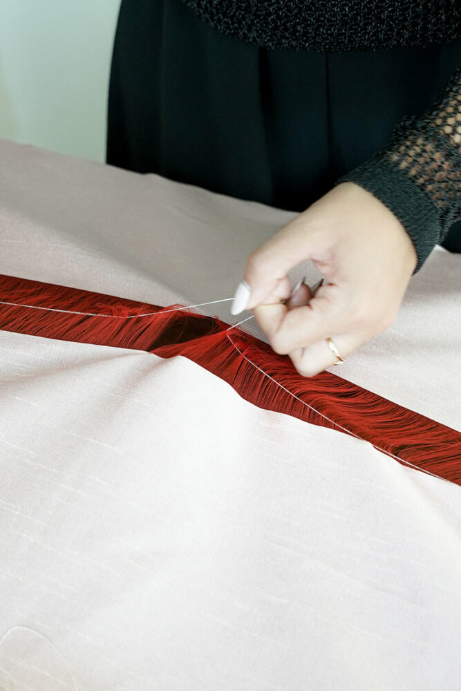 areen’s flowing installation unravels thousands of threads at dubai ...