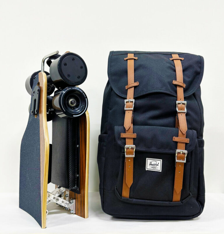 electric corsair longboard folds in the middle like briefcase so ...