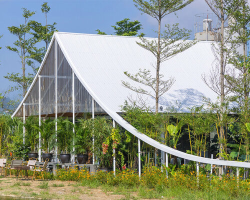 steel H-beams build coffee shop situated under railway elevated bridge ...