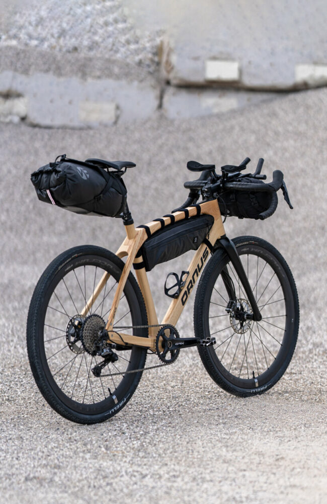 ornus gravel wood bike combines sustainability and comfort for smooth terrain transitions