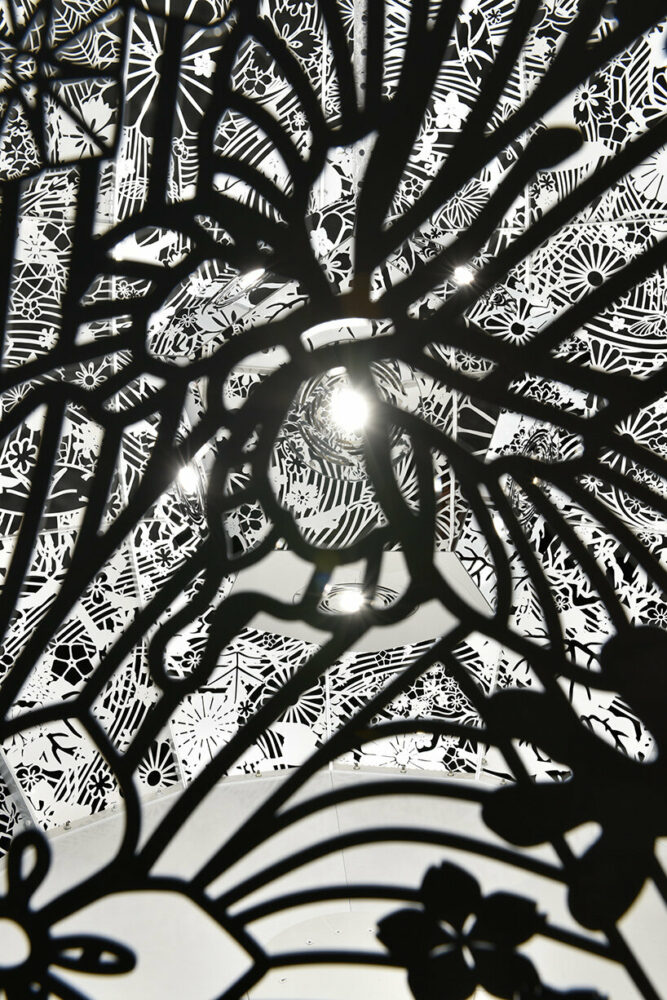 shinji ohmaki's delicately carved vessels cast shadows of flowers at ...