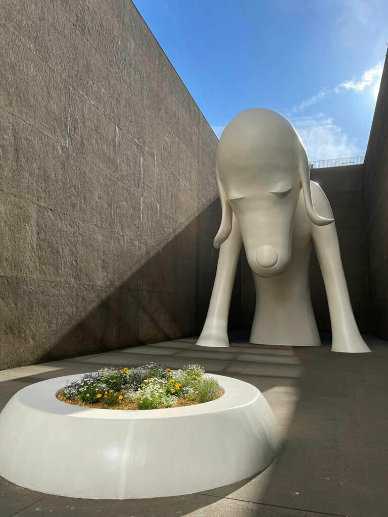 colossal dog sculpture welcomes visitors to yoshitomo nara's solo ...