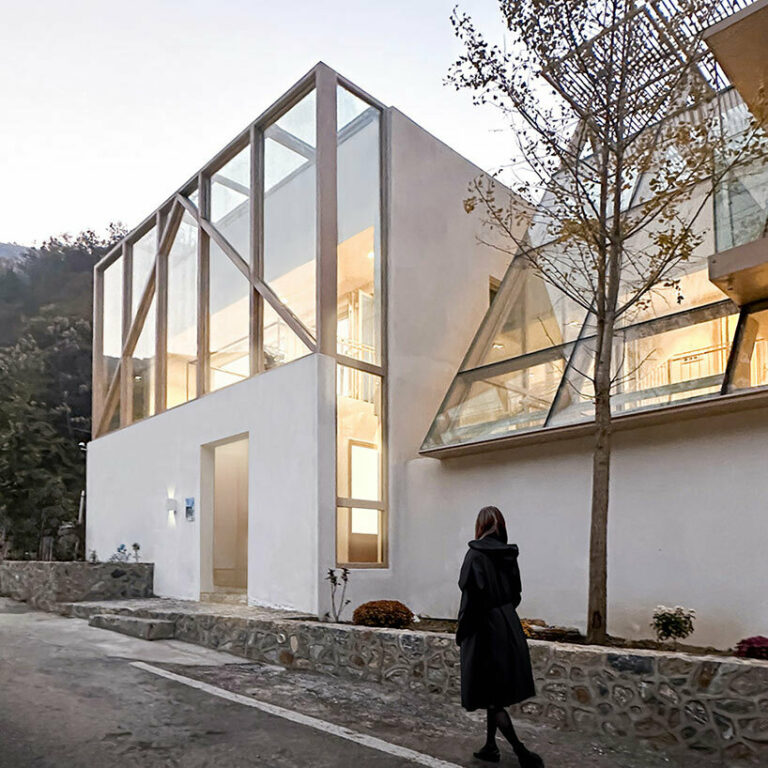 brick & cube architects' youli hotel glows within a mountain village