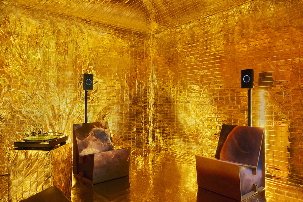 vinyl record with real outer space rocks spins during miami art week