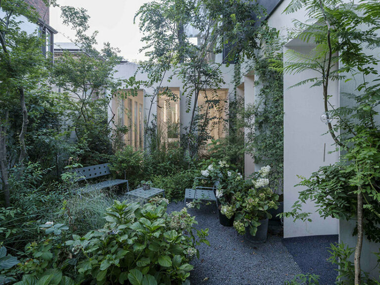 HAS design & research hides this 'forest villa' among lush gardens