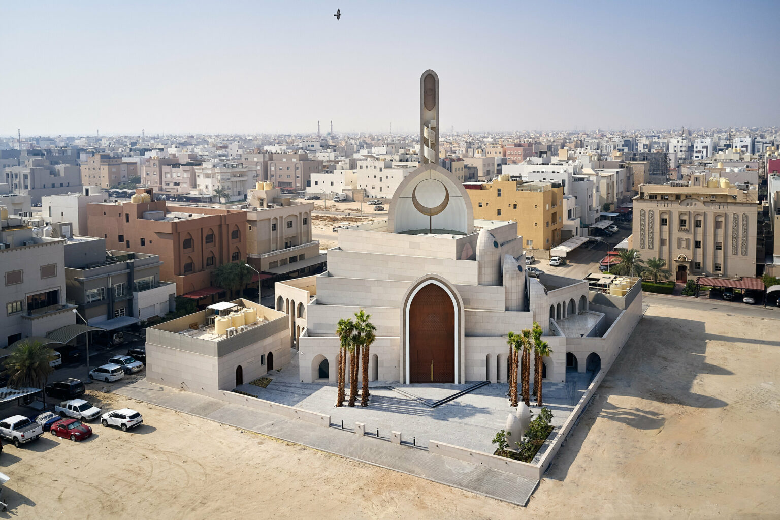 stacked volumes & half domes shape babnimnim's kuwait mosque