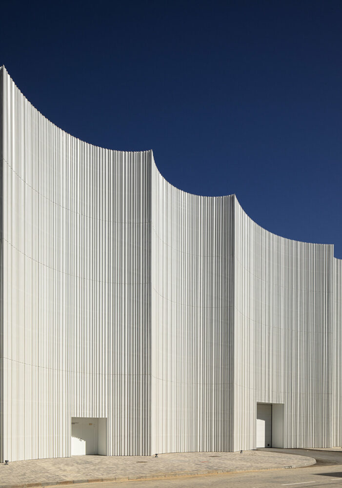 rhythmic & translucent arches envelop mayoral logistics centre building ...