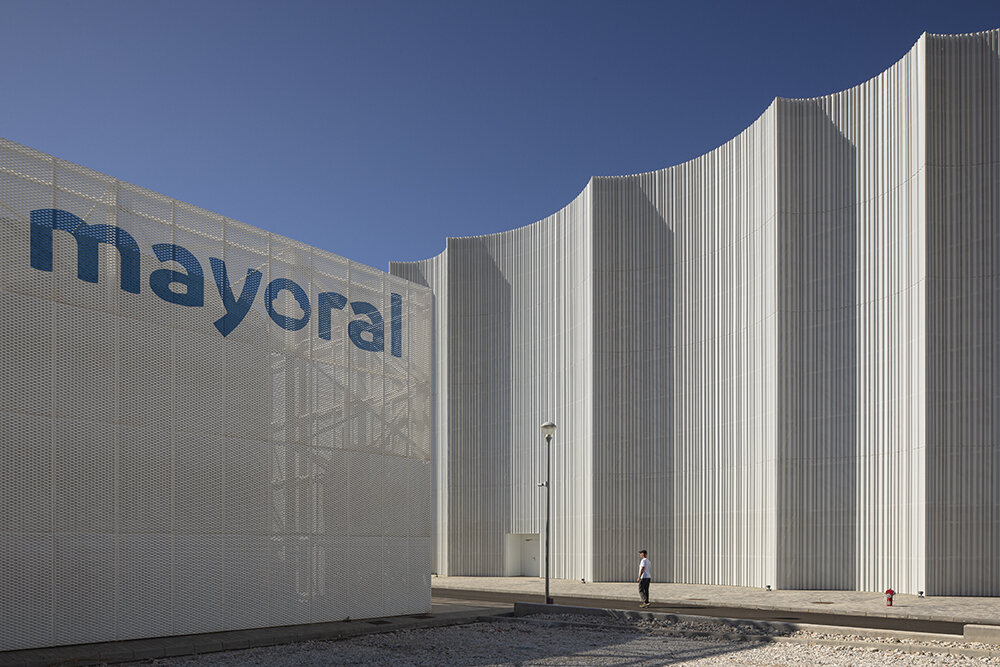 rhythmic & translucent arches envelop mayoral logistics centre building ...