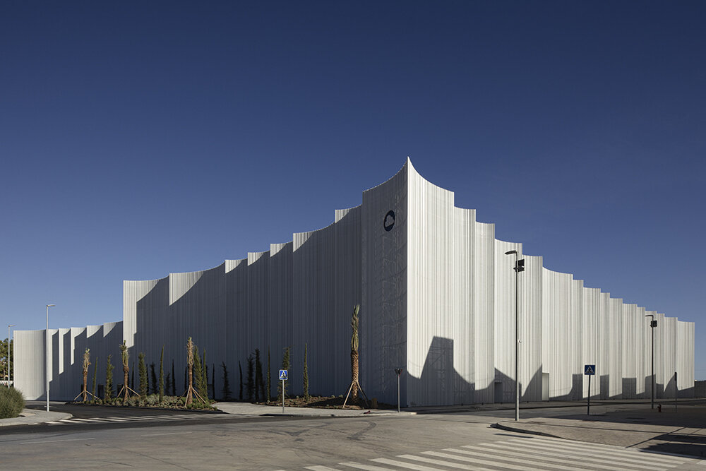 rhythmic & translucent arches envelop mayoral logistics centre building ...