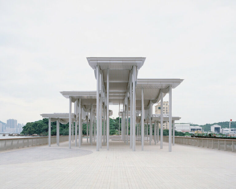 undulating canopy by new office works shelters waterfront promenade in ...