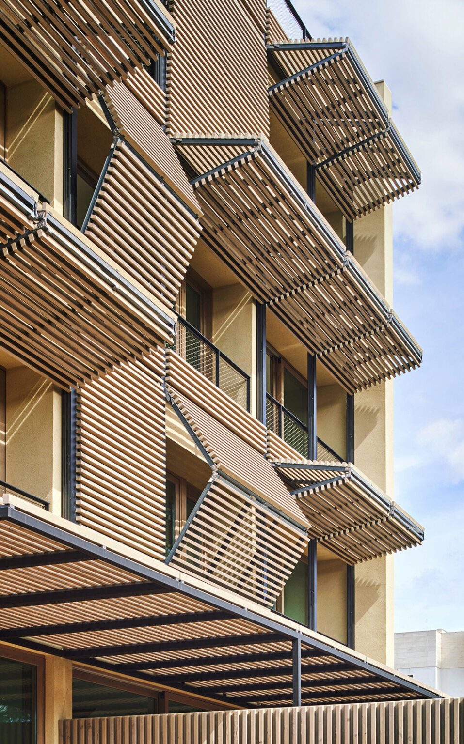 OHLAB facade switches from shutters to pergolas across paral·lel ...