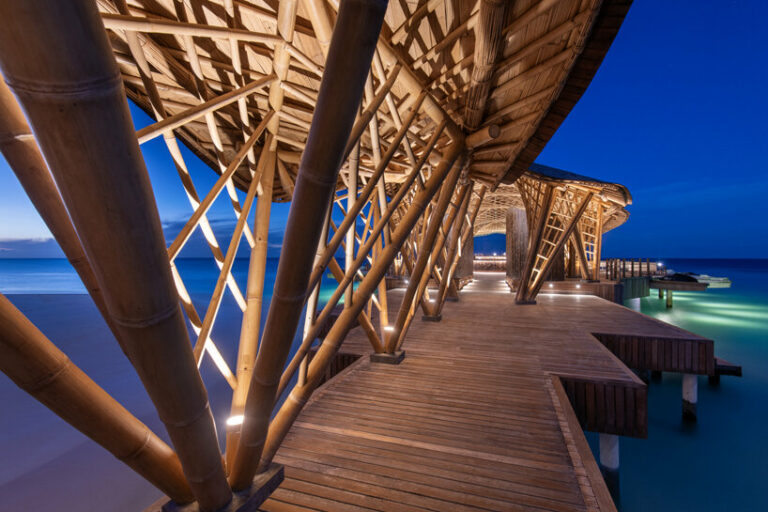 atelier nomadic's overwater restaurant rises like a sea creature in the ...