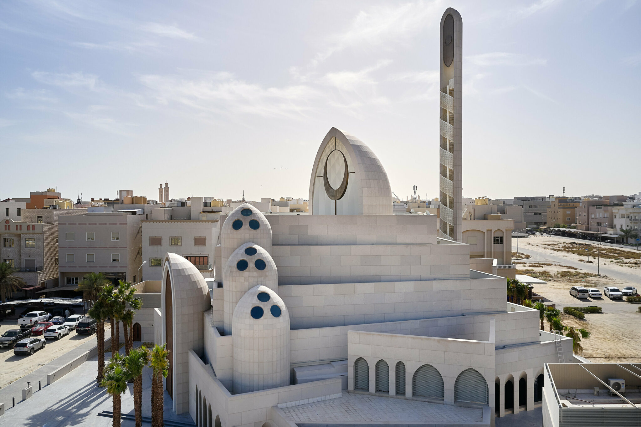 stacked volumes & half domes shape babnimnim's kuwait mosque