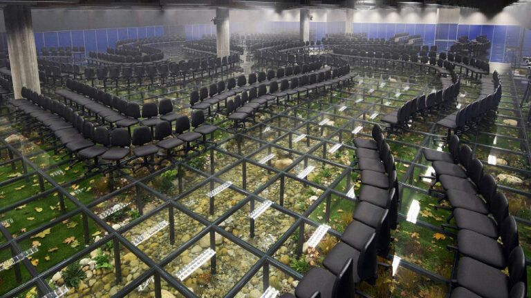 AMO sets prada's FW24 menswear show in office space maze above glass ...