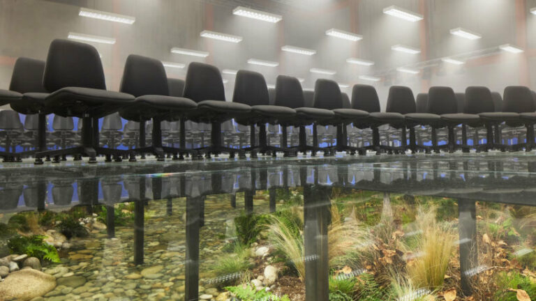 AMO sets prada's FW24 menswear show in office space maze above glass ...