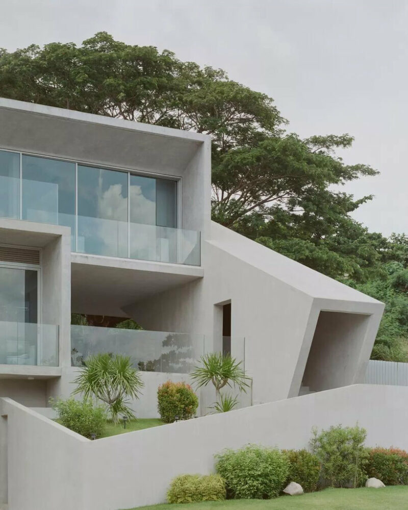 concrete cubes overlooking the ocean and sky compose CAZA's house in ...