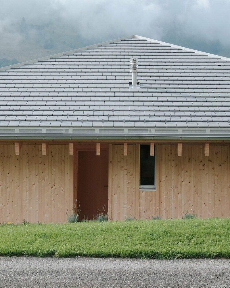 architect charly jolliet tops minimalist alpine house with pyramid roof