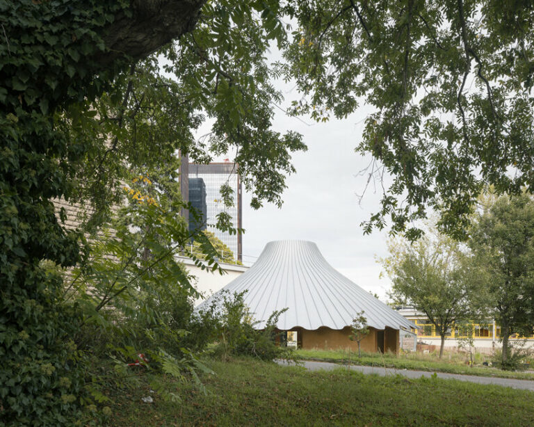 l'atelier senzu builds carousel-inspired rammed earth pavilion for ...