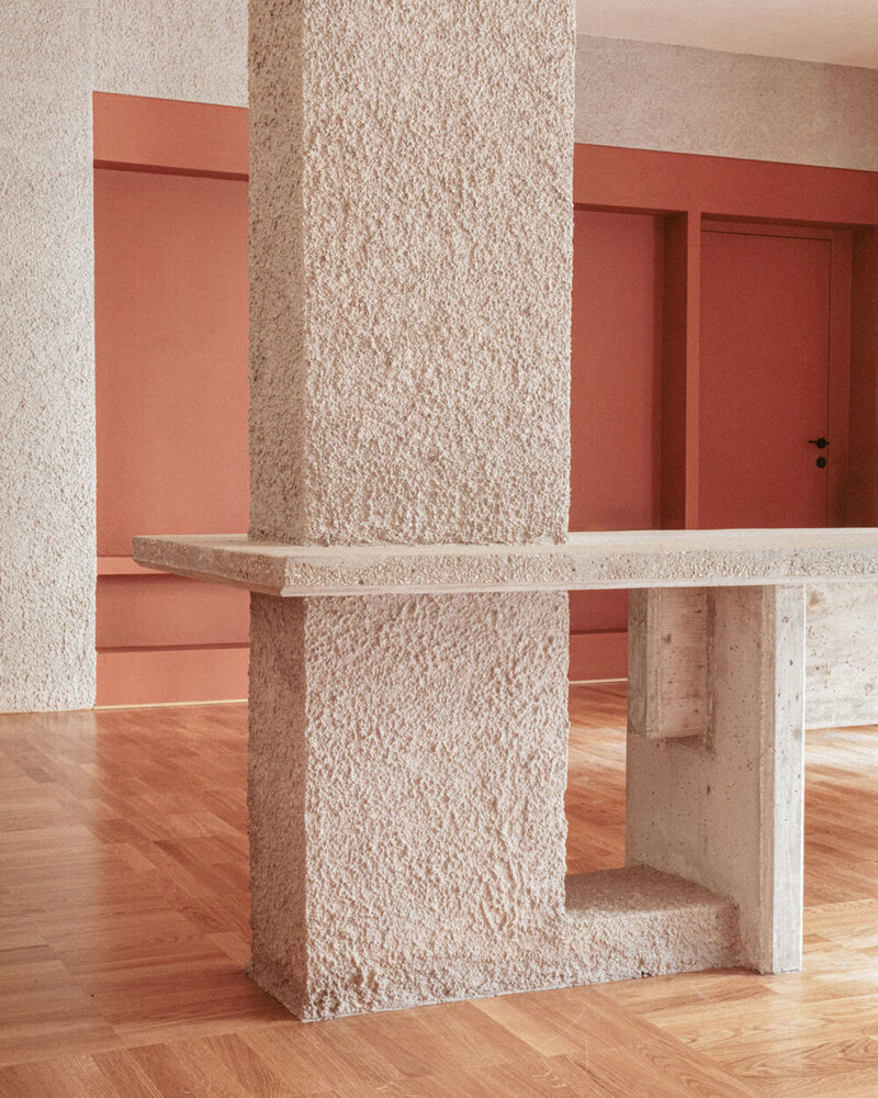 exposed column takes center stage in studio traccia's renovated 1970s flat