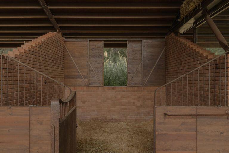 rustic horse stable by módica ledezma blends into its lush mexican setting