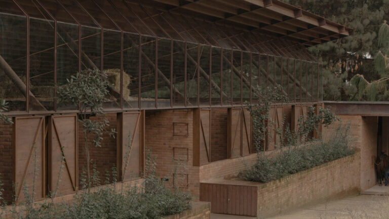 rustic horse stable by módica ledezma blends into its lush mexican setting