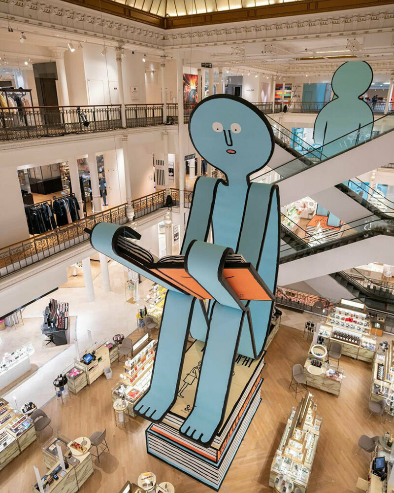 jean jullien's paper people land at le bon marché for book-themed ...