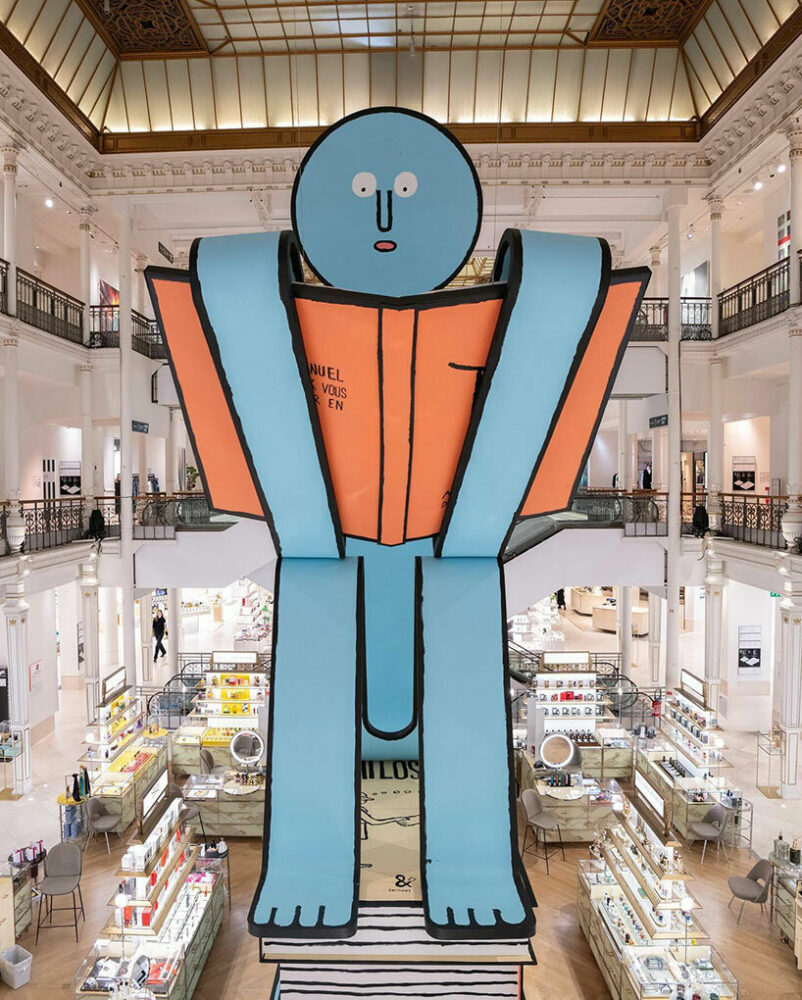 jean jullien's paper people land at le bon marché for book-themed exhibition in paris