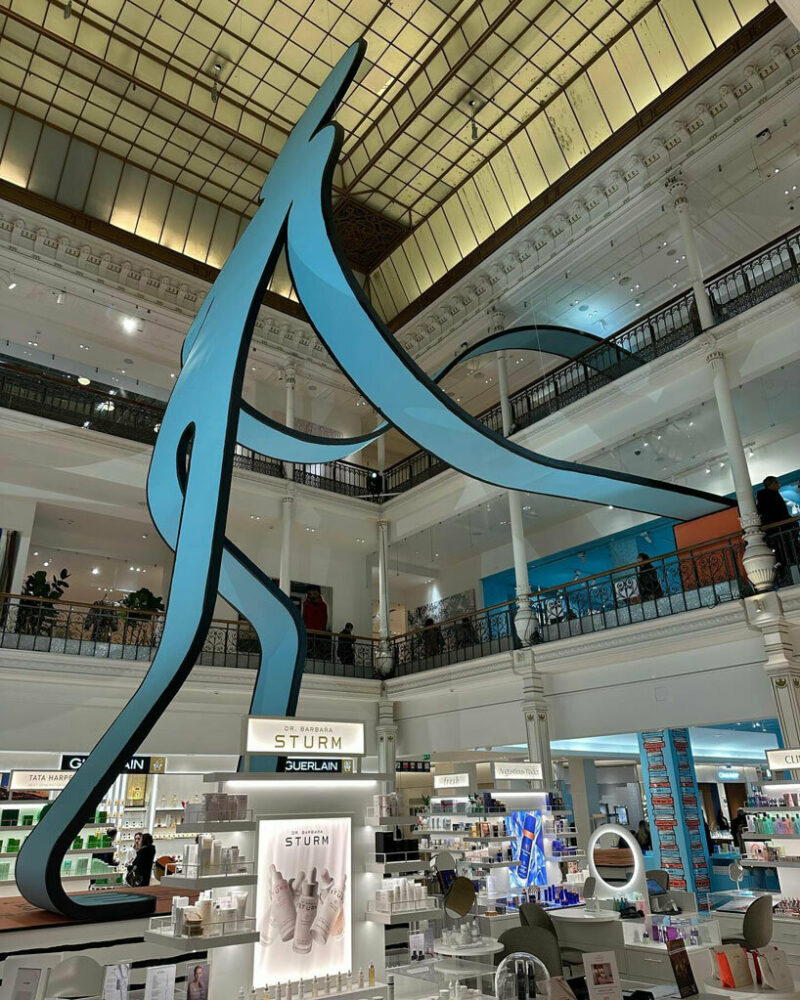 jean jullien's paper people land at le bon marché for book-themed ...