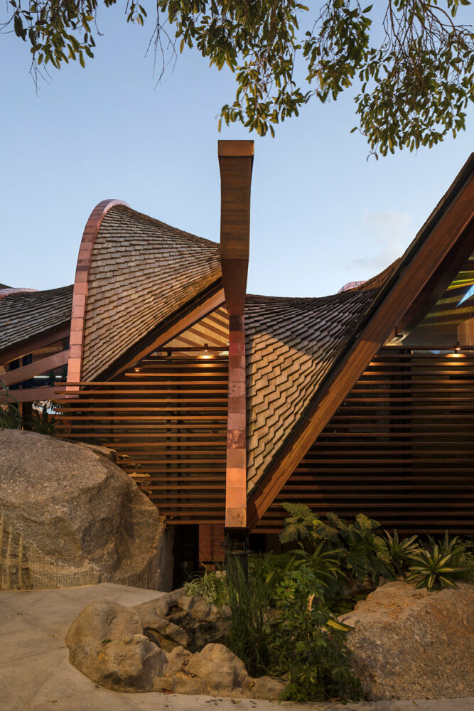 the wave house resembles a vessel sailing through rio de janeiro's waters